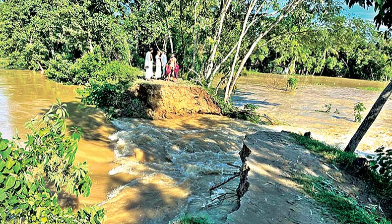 New Age | Four villages flooded as Muhuri overflows, breaches embankment