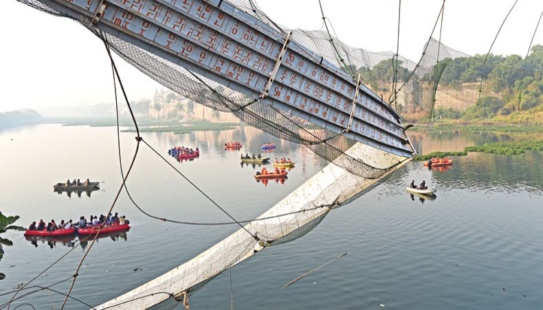 New Age | India bridge collapse kills 132