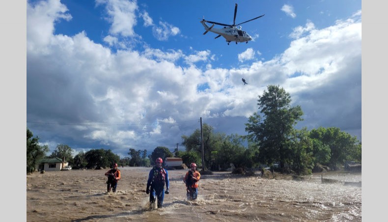 New Age | Flash floods sweep away houses, cars in Australian town