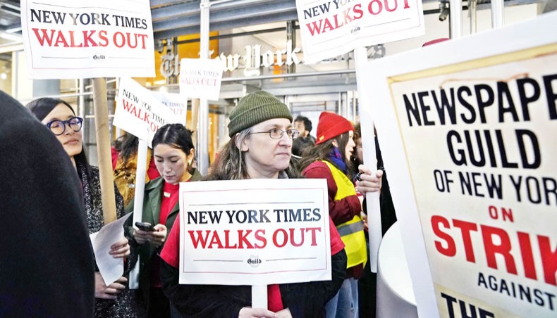 New Age | NYT workers stage first strike in 40 years