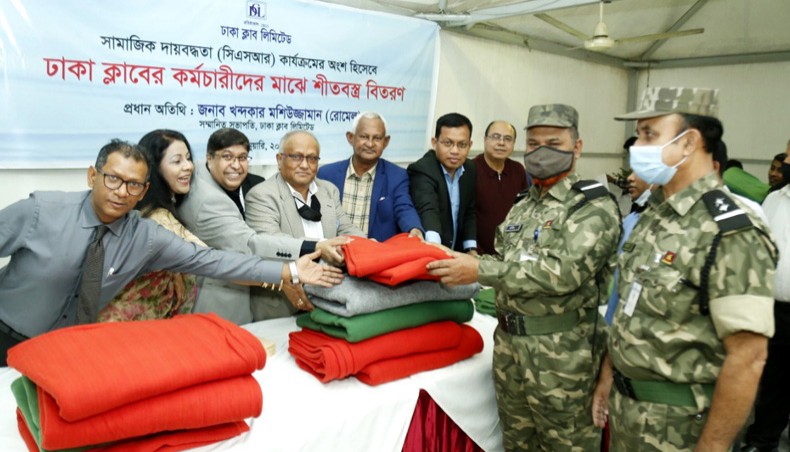 New Age | Dhaka Club distributes warm clothes