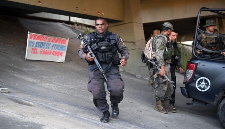 New Age | Brazil police raid leaves at least 13 dead in favela near Rio