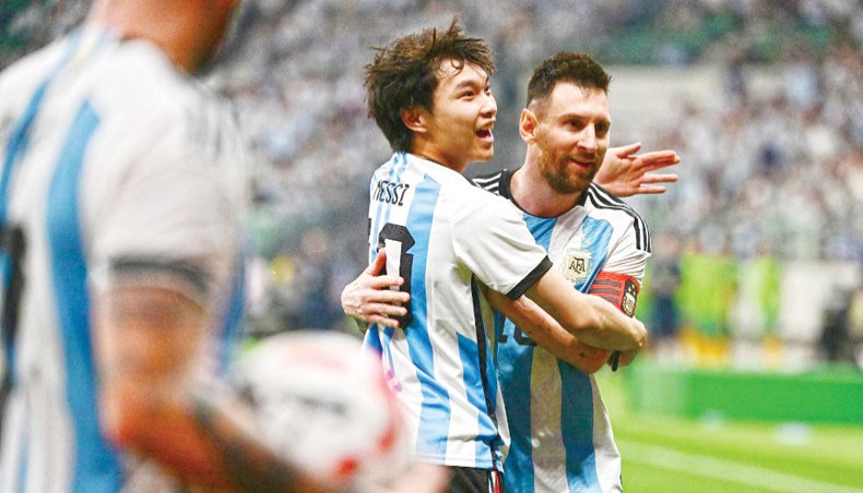 New Age | Pitch invader detained after hugging Messi