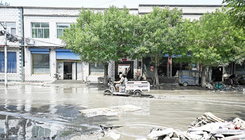 New Age | Seven killed in China floods