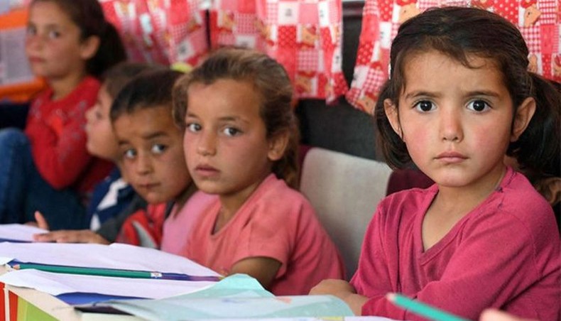 New Age | Syrian children return to school amid deep economic crisis