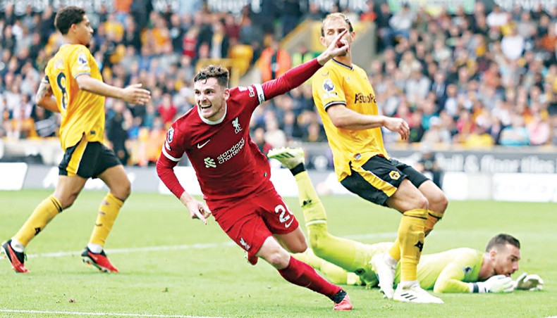 Reds tame Wolves with late goals