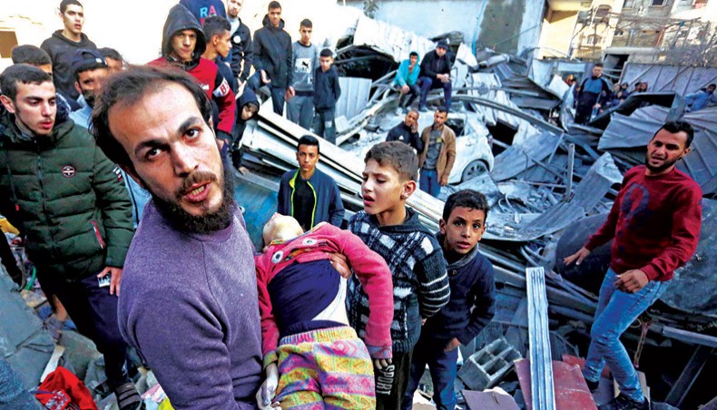 New Age | Palestinians’ death toll reaches 21,672